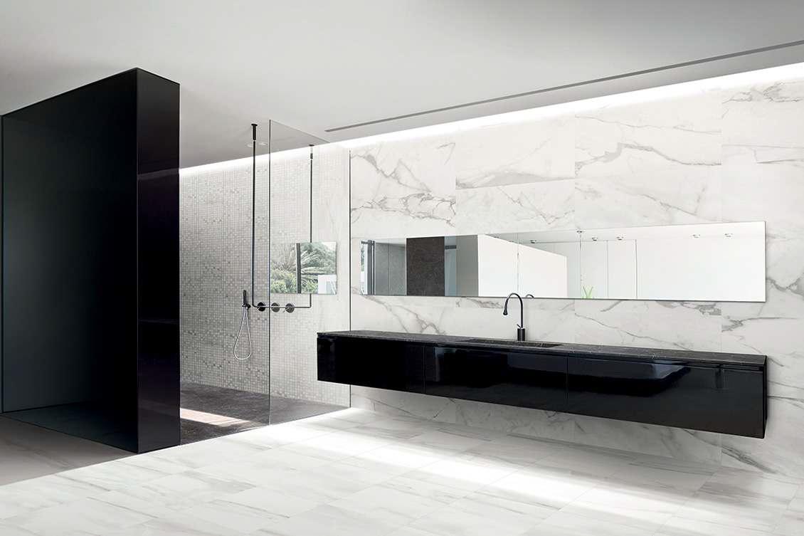 Black marble effect bathroom tiles is the unconventional choice that ...